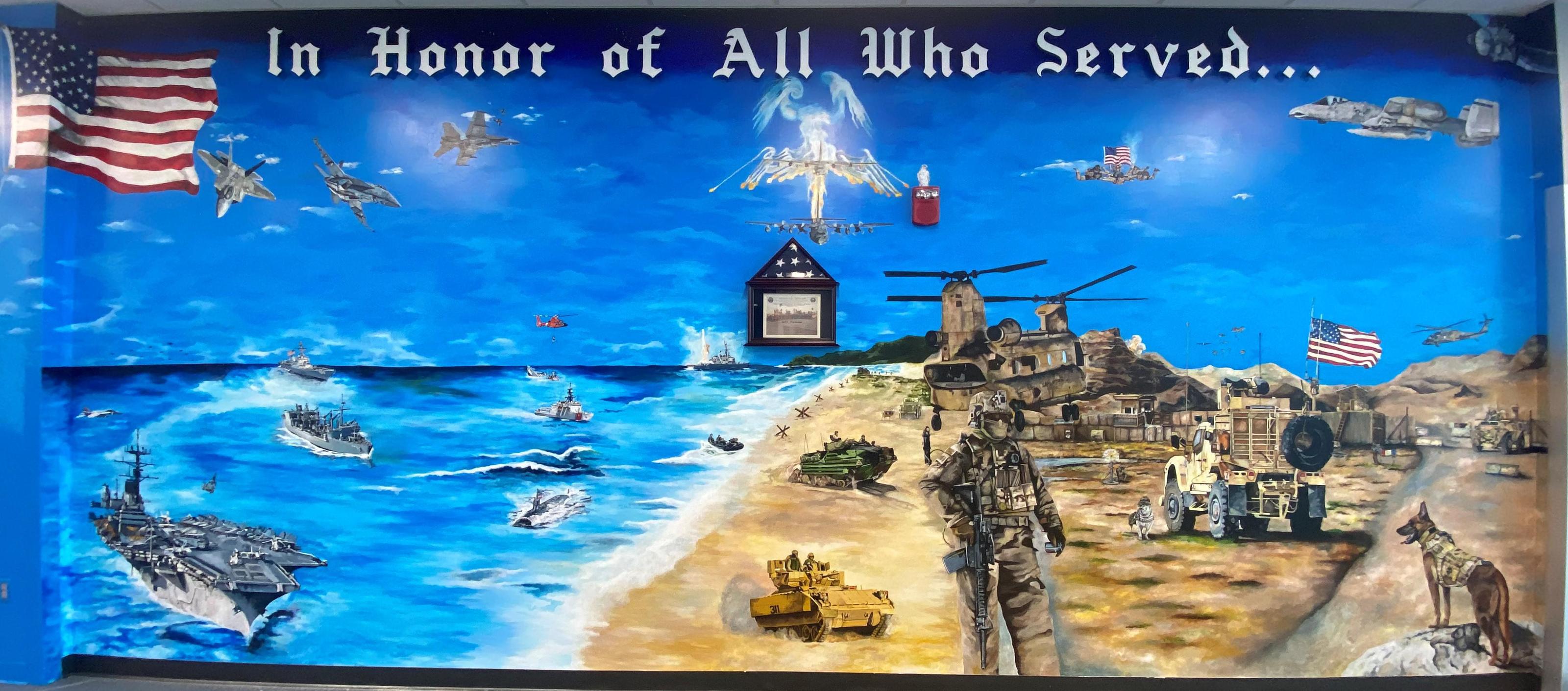 Moore makes memorial mural